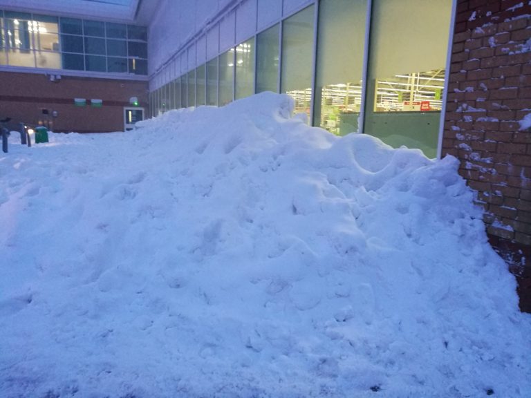 PHOTOS- Snow drifting up against the windows of Cwmbran Asda and ...